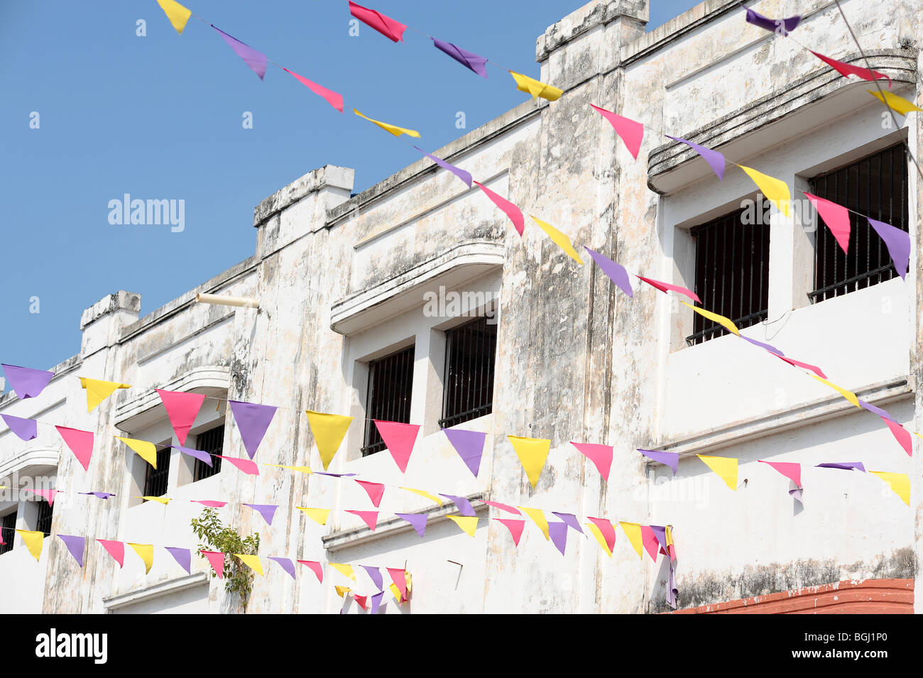 Flags strung over street hi-res stock photography and images - Alamy