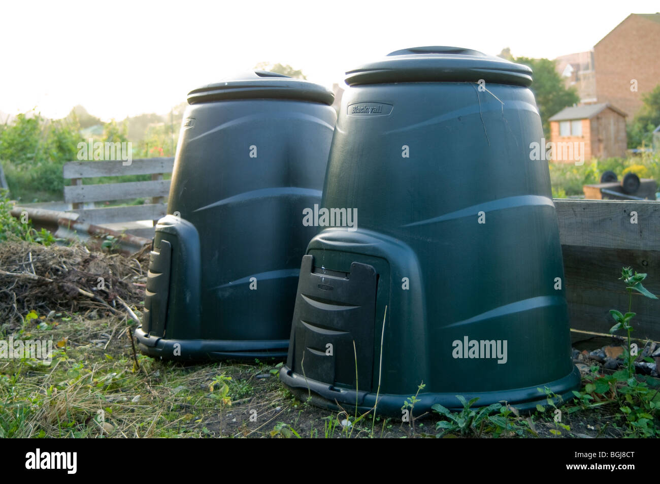 Pair of compost bins on an allotment plot Stock Photo - Alamy