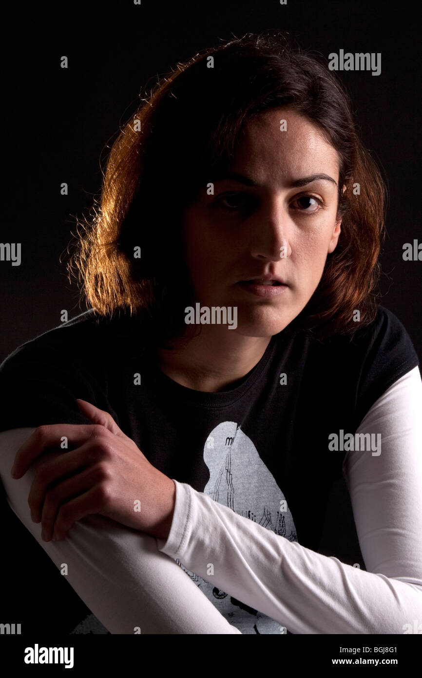 Spanish woman, head shot studio portrait Stock Photo - Alamy