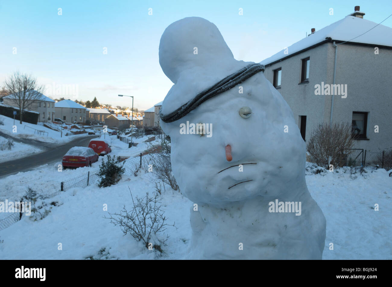An unhappy snowman Stock Photo - Alamy