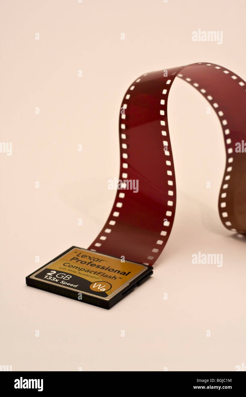 2GB Compact Flash Card with 35mm film on white background Stock Photo ...