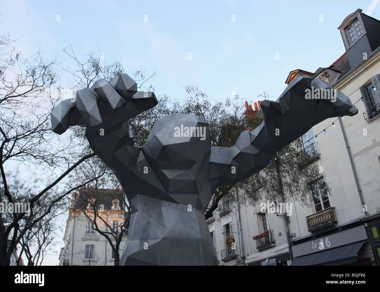 large metal statue with outstretched arms Tours France January 2010 ...