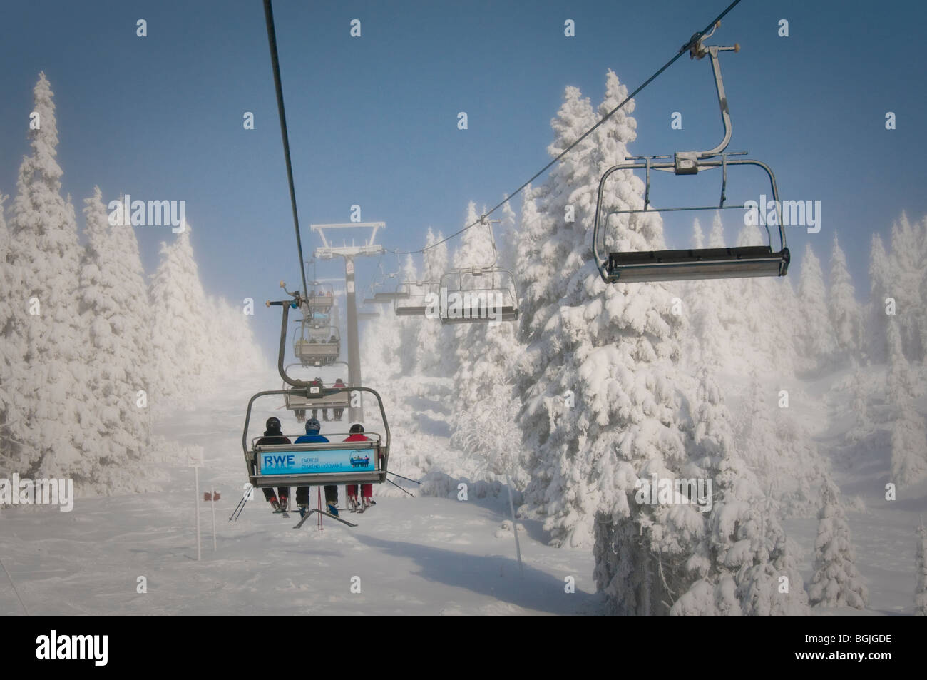 View of Skiers at the chair lift in Cerna Hora Ski Resort, Karkonosze ...