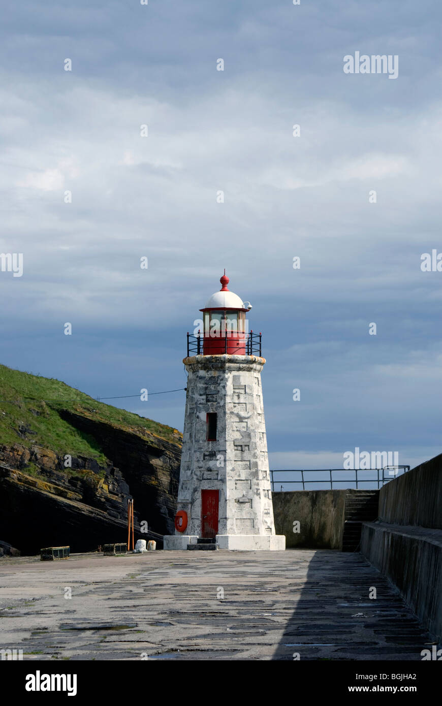 The lighthouse at the harbour mouth at Lybster, in Caihness, on the far ...