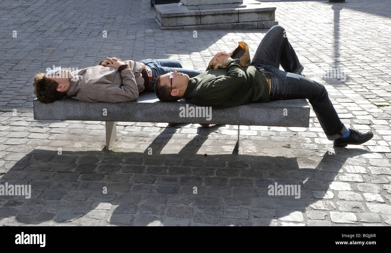 Two People Sleep On Bench Homeless Uk Woman Hi Res Stock Photography