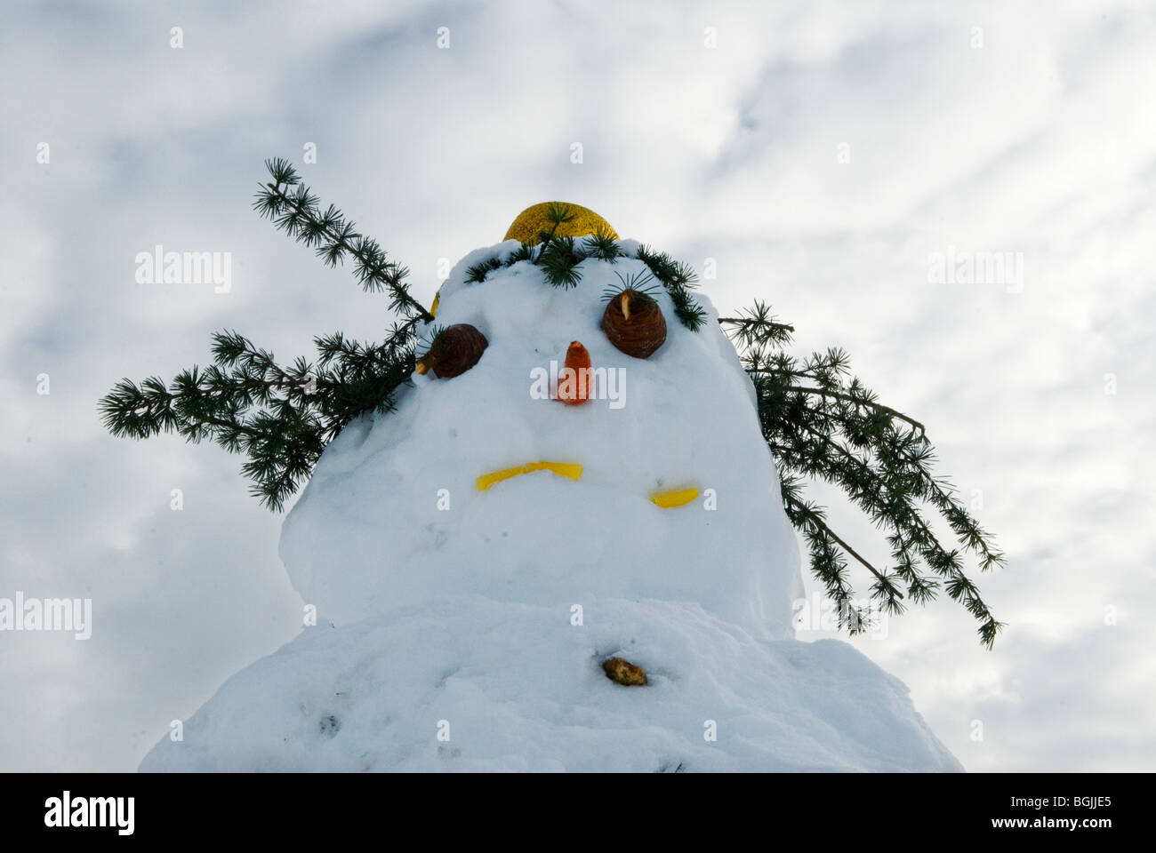 Snowman UK. Glum, sad face looking glum. Real snow nobody 2010 2010s ...