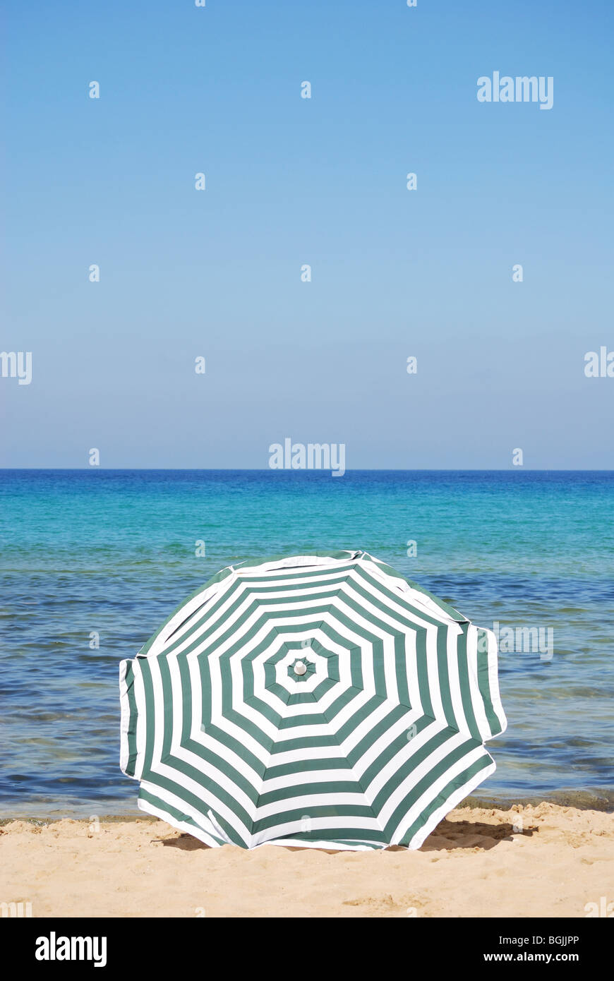 Parasol on the beach Stock Photo - Alamy