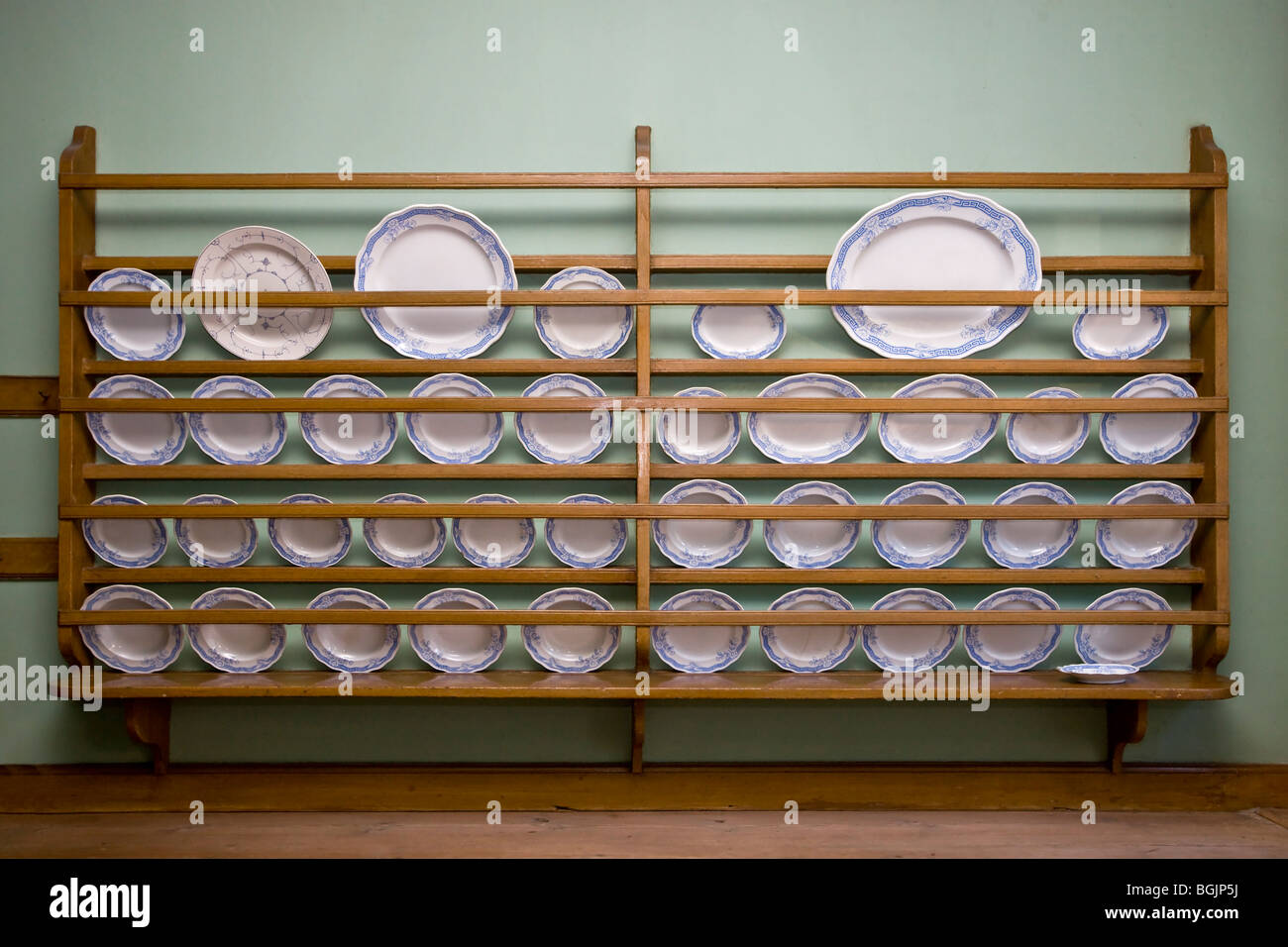 Old kitchen shelf with plates Stock Photo - Alamy