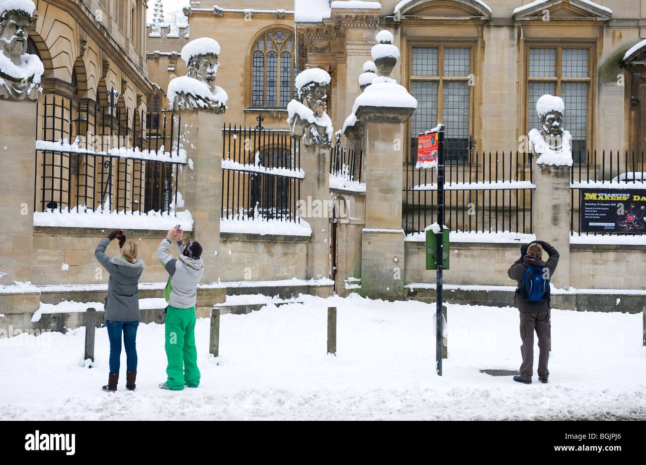 photographers in the snow outside the Sheldonian Theatre and Museum of ...