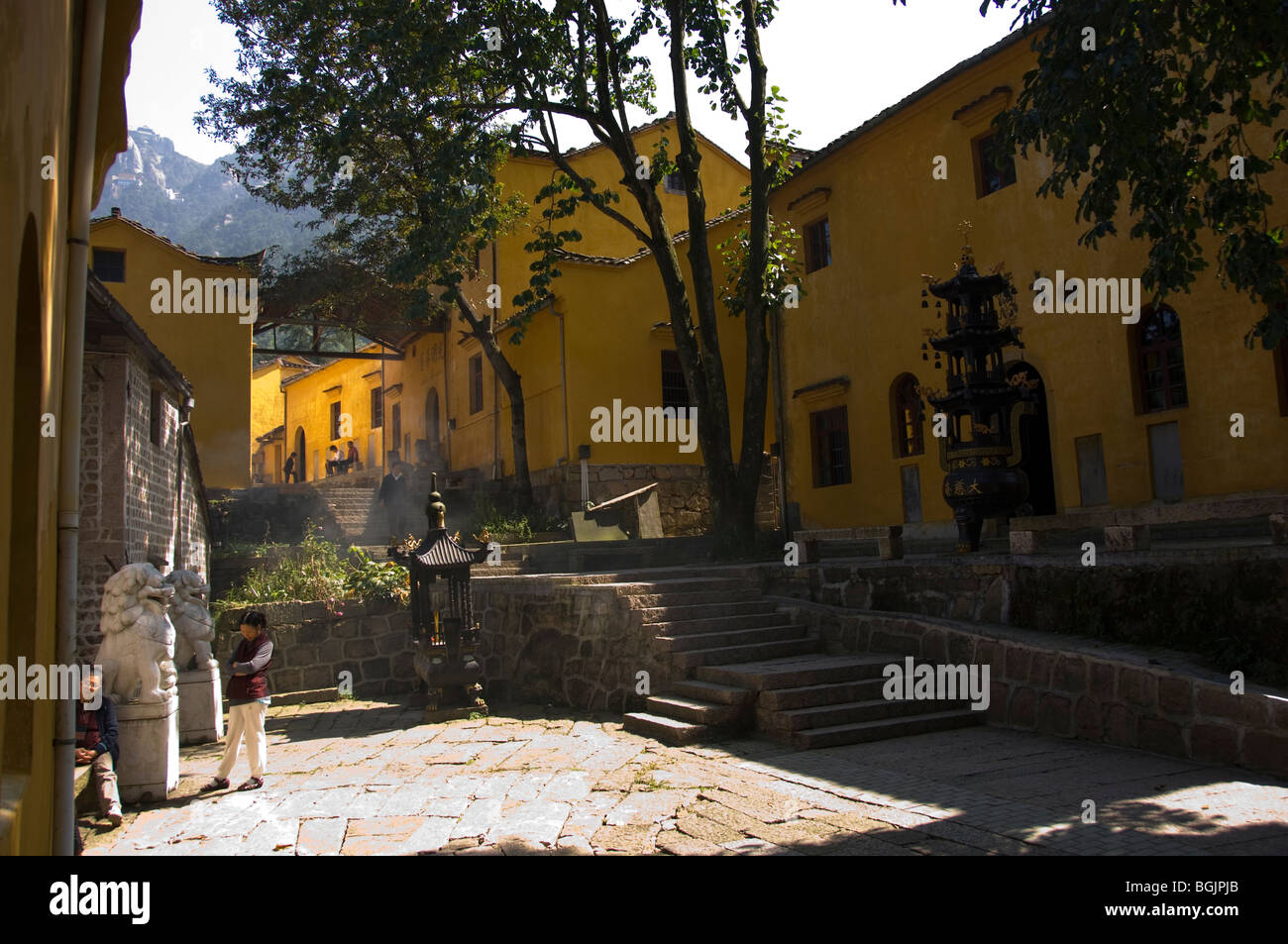 Yellow walled monasteries, temples and nunneries line the pilgrim trail ...