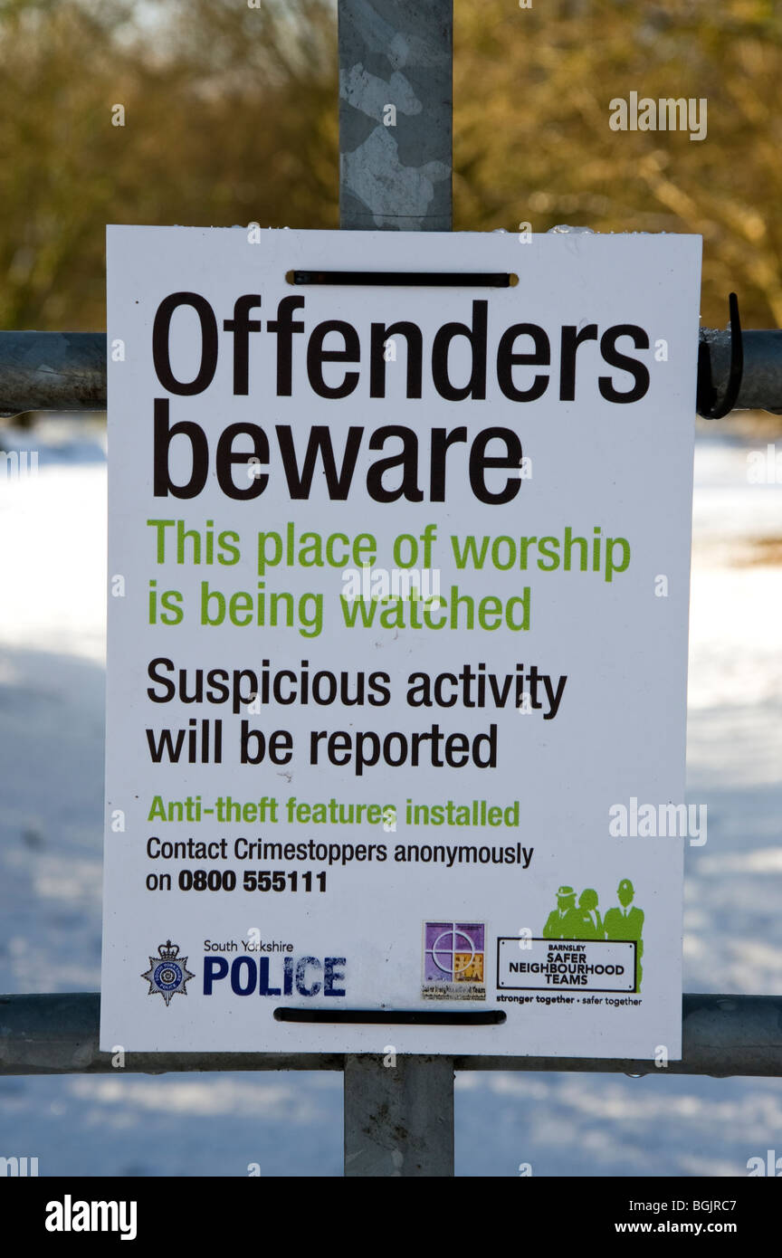 Sign warning in grounds of a church Stock Photo - Alamy