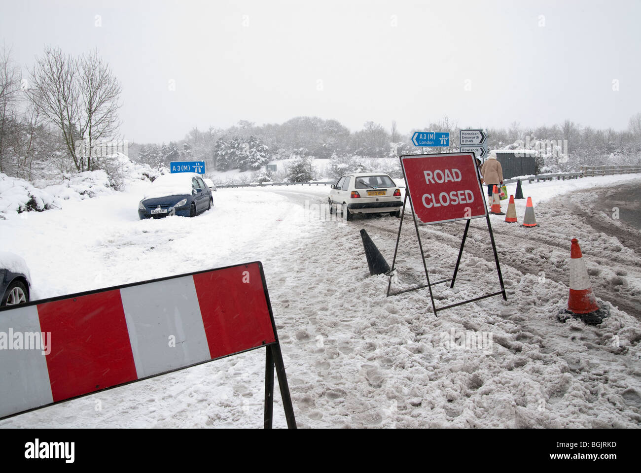 Abandoded vehicles and road closed signs. Major snow fall A3 area of ...