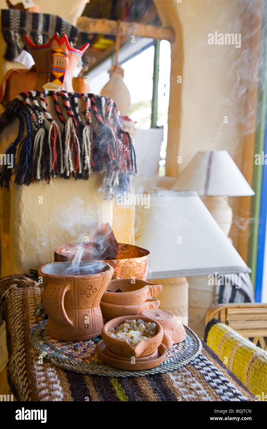 Frankincense, a symbol of Oman, burning in an Omani household in Muscat ...