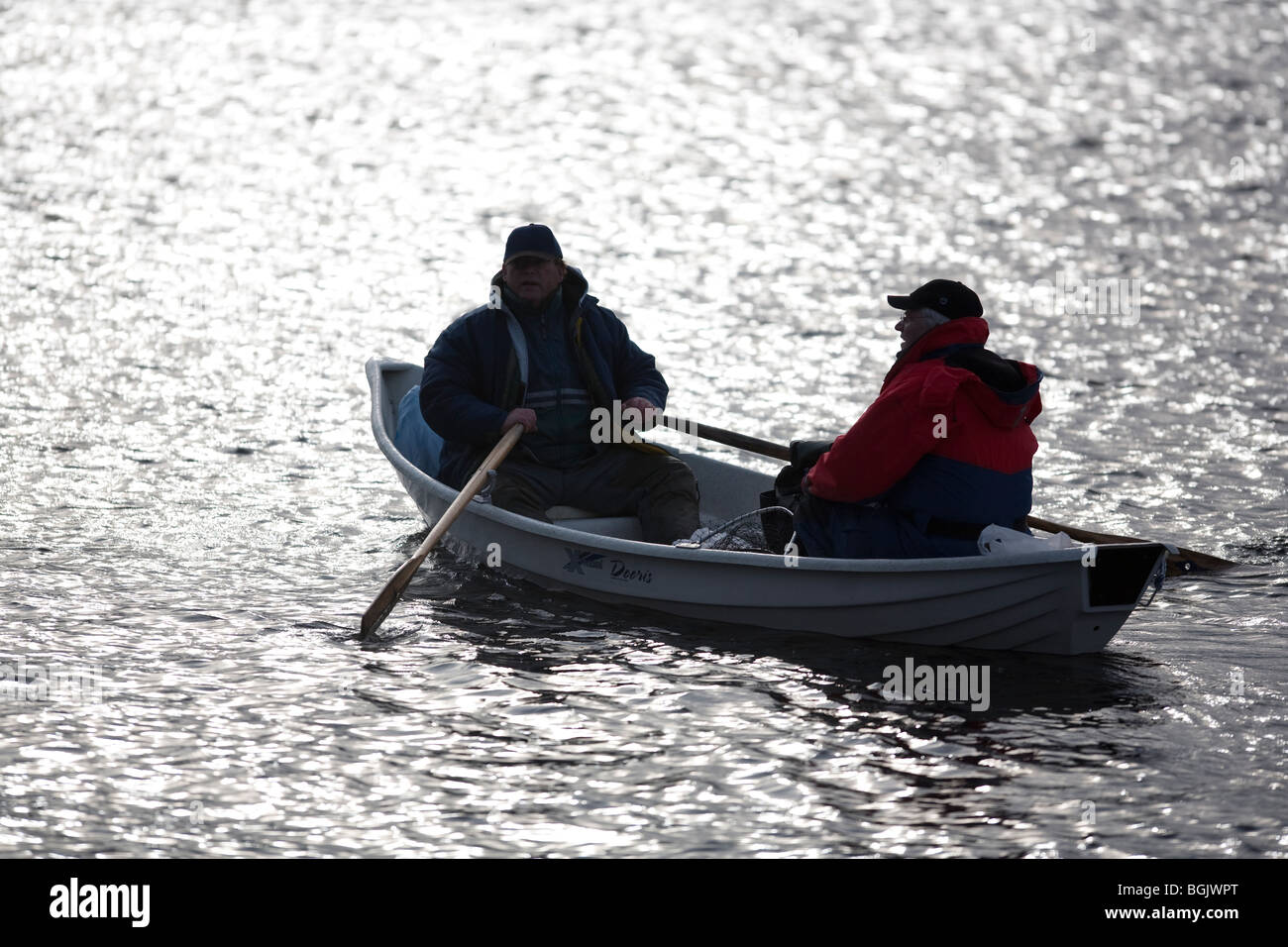 Black silhouettes two sitting hi-res stock photography and images - Alamy