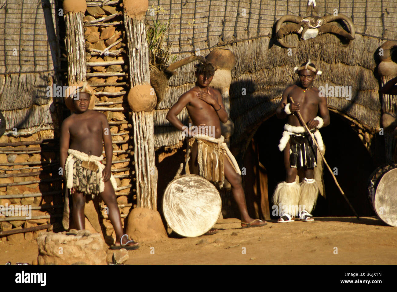 Zulu warriors at communal lodge, Shakaland, South Africa Stock Photo ...