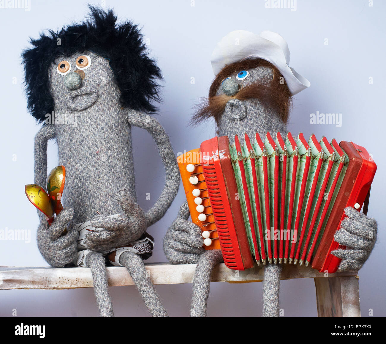 Music band from woman doll with spoons and man doll with accordion ...