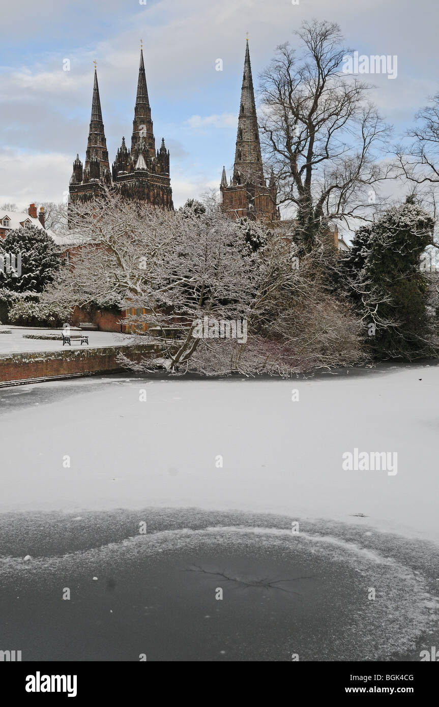 Lichfield Cathedral with Memorial Gardens an a frozen Minster Pool ...