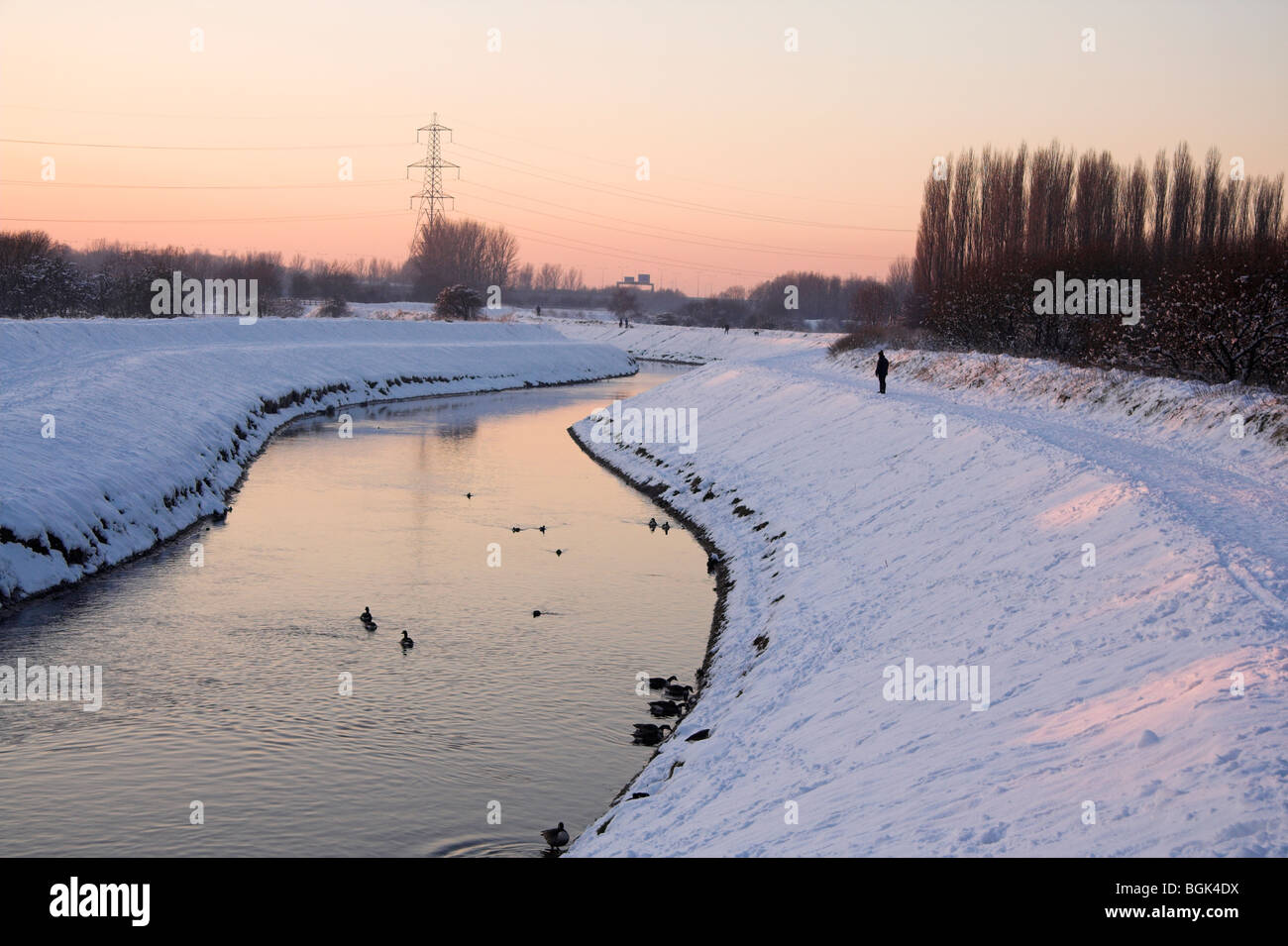 Sunset, River Mersey Valley covered in snow, Chorlton Water Park ...