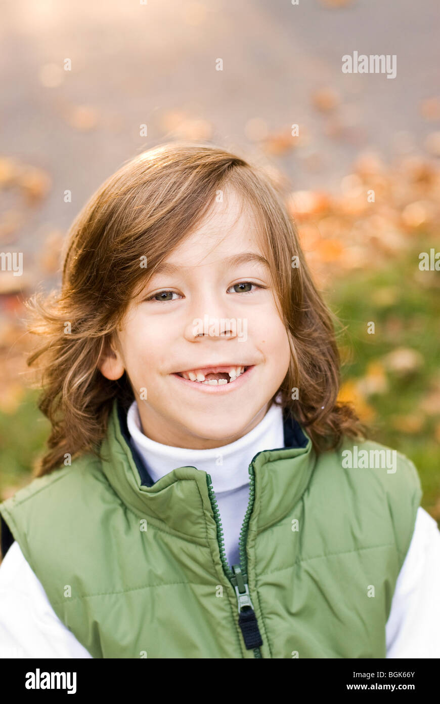 boy with missing teeth smiling Stock Photo - Alamy