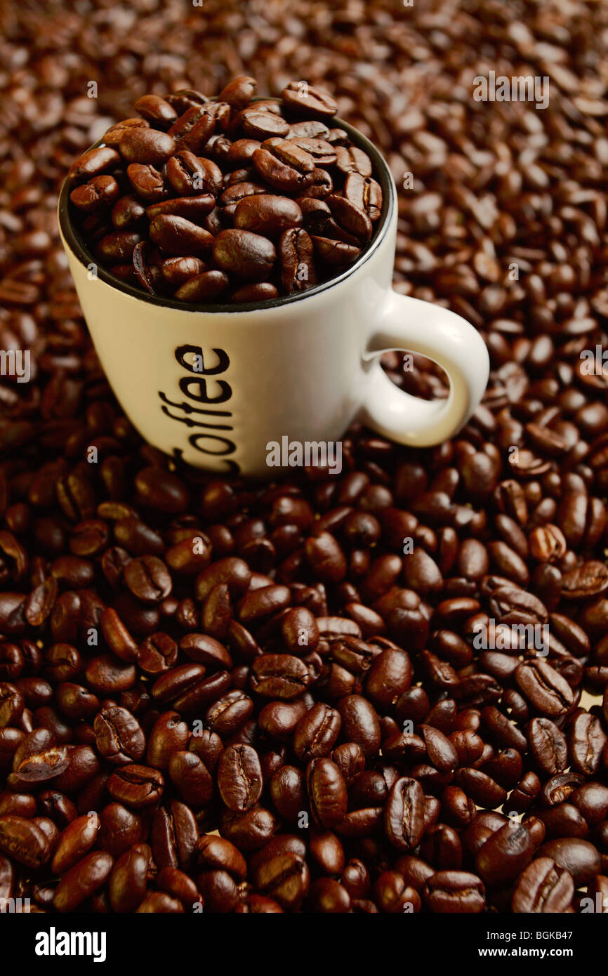 coffee cup with coffee beans Stock Photo - Alamy