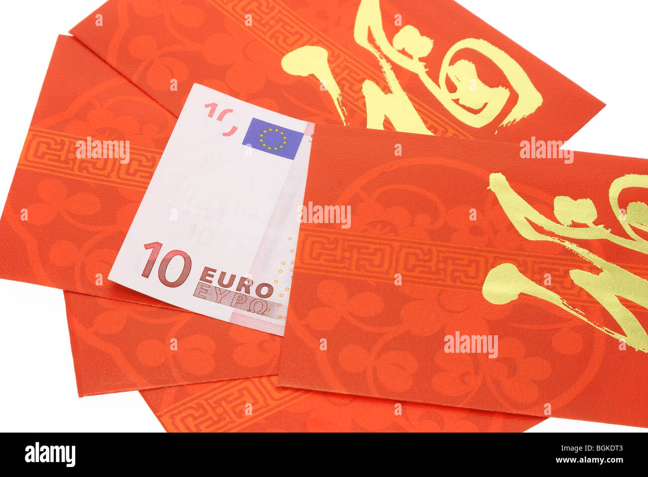 Chinese New Year red packets and Euro currency note on white Stock ...