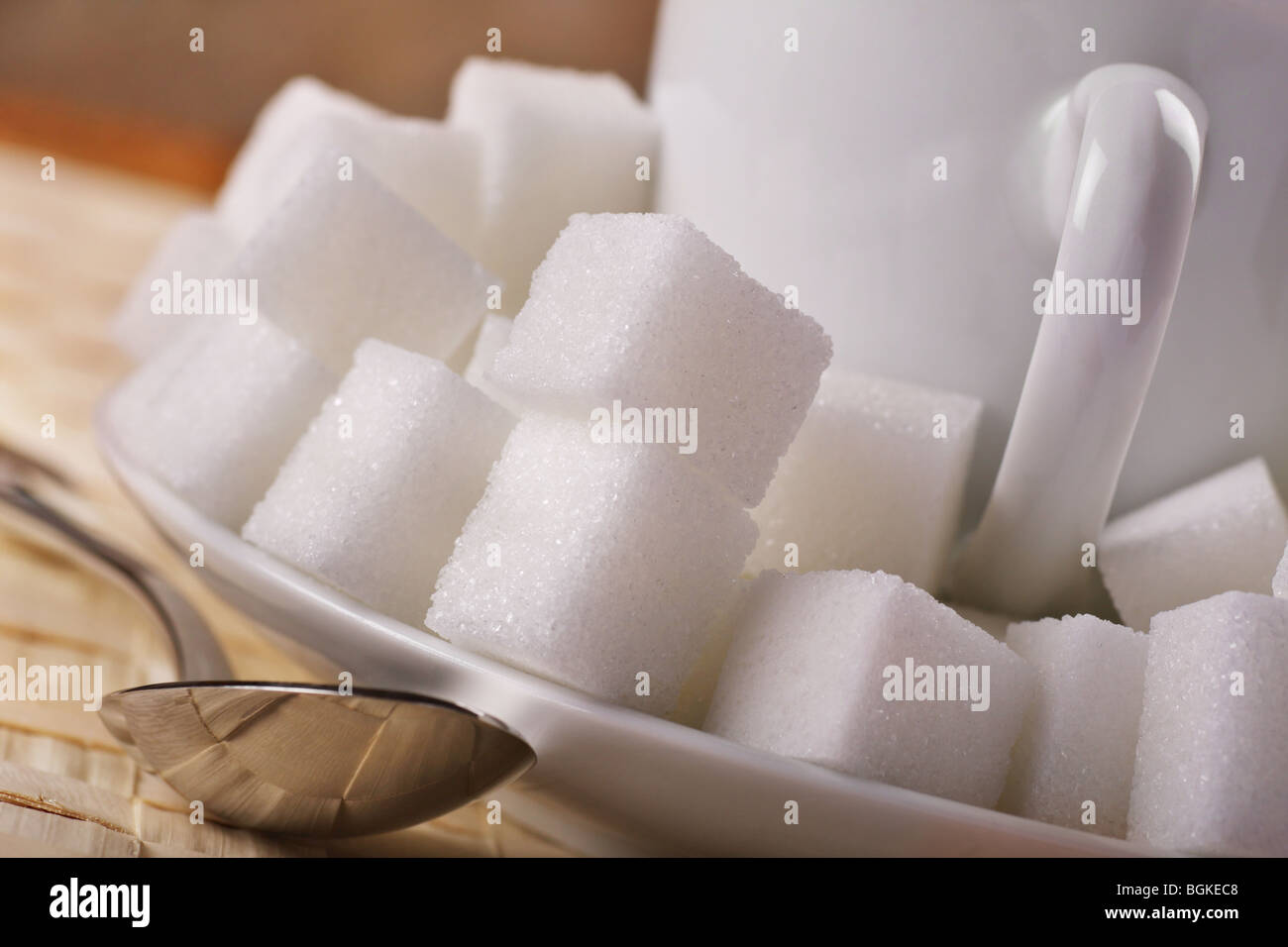 tea or coffee drink with lots of sugar cubes Stock Photo - Alamy
