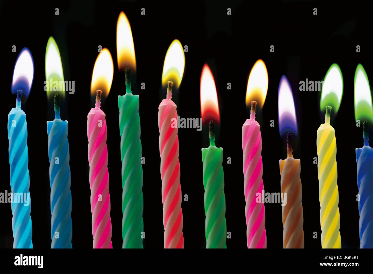 Birthday candles lit in row hi-res stock photography and images - Alamy