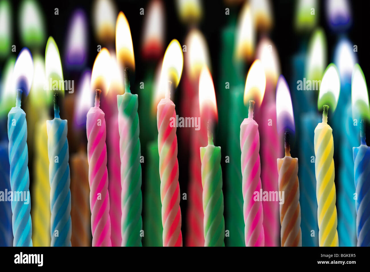 Birthday candles lit in row hi-res stock photography and images - Alamy