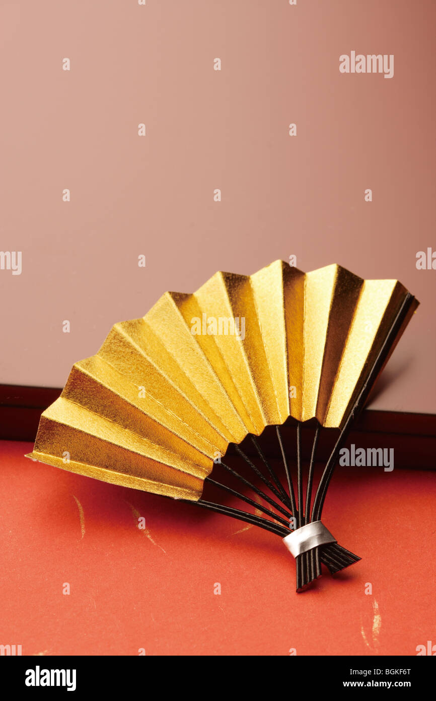 Gold fan hi-res stock photography and images - Alamy