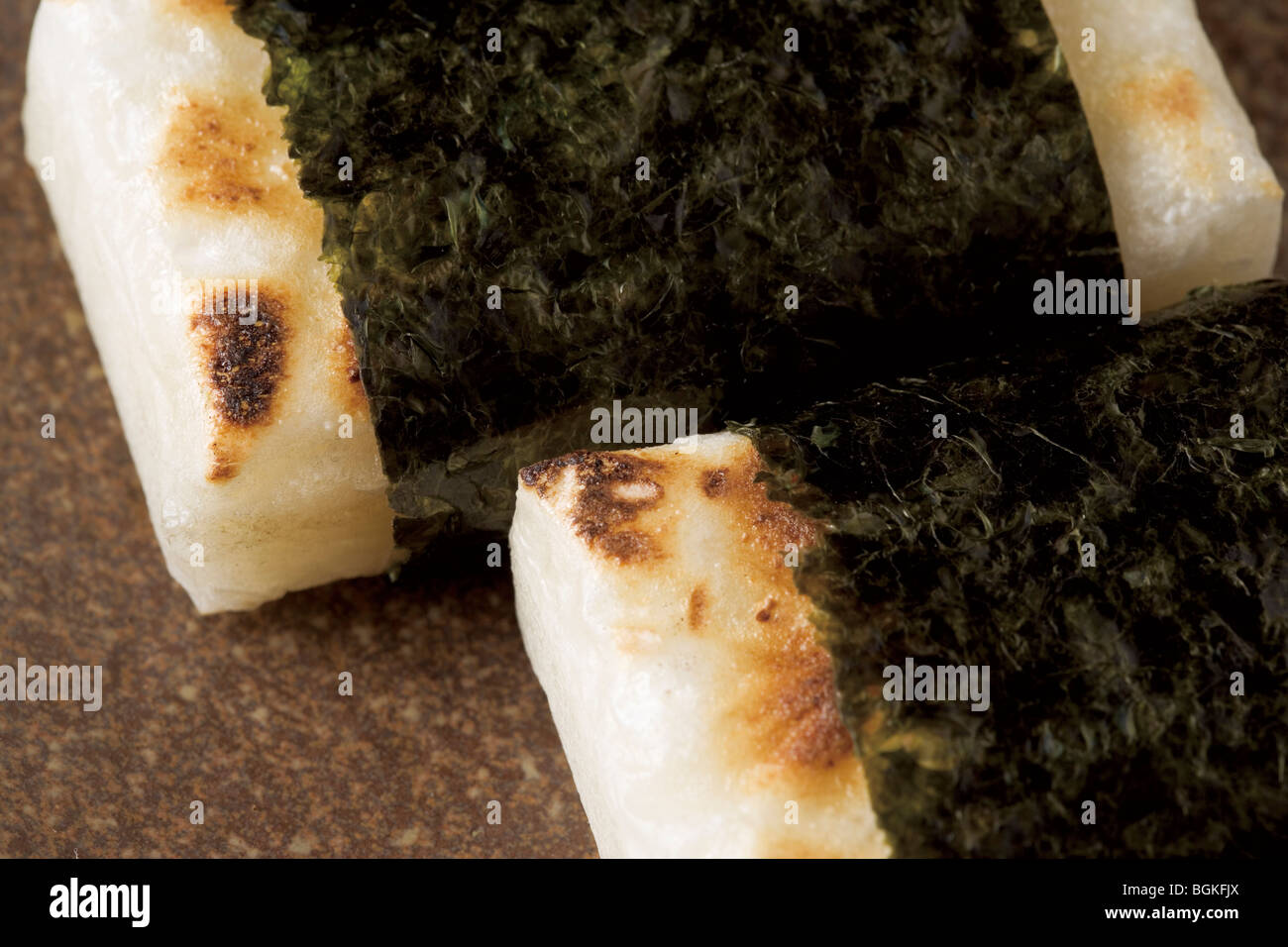 Two rice cakes with seaweed wrap Stock Photo - Alamy