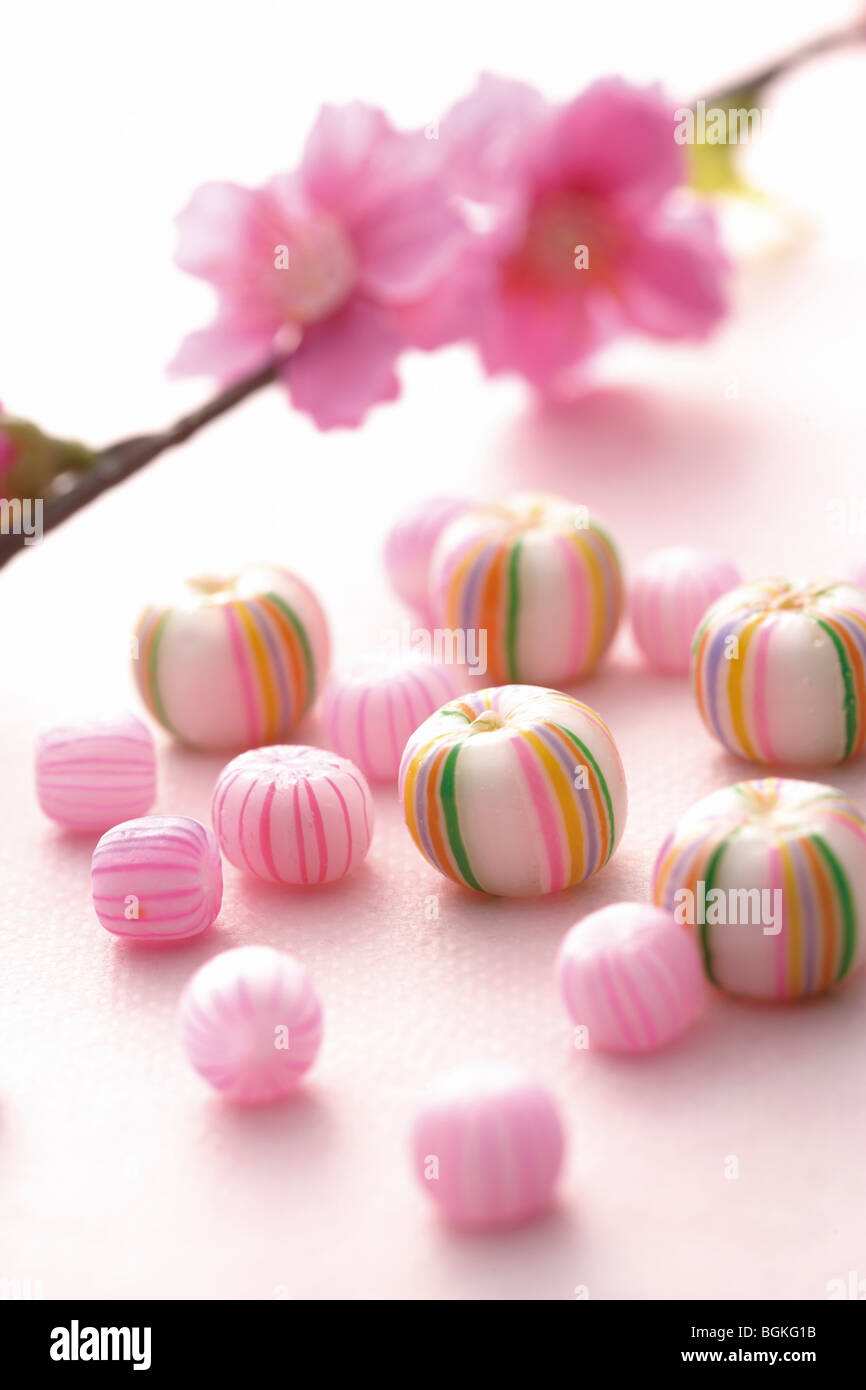 Pink flower and sweets Stock Photo - Alamy