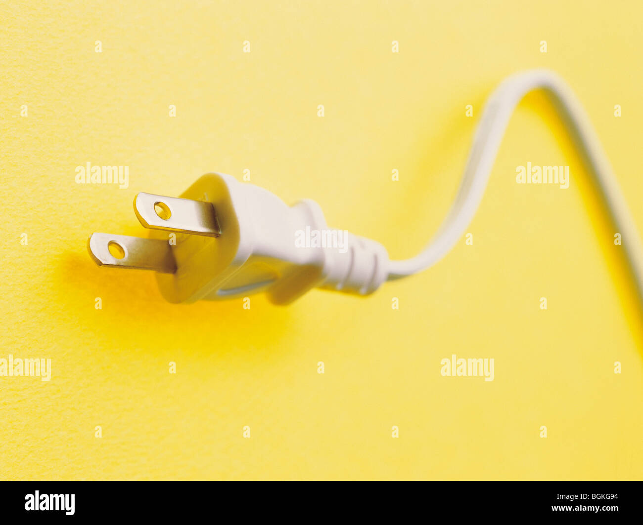 Electric plug colored background Stock Photo - Alamy