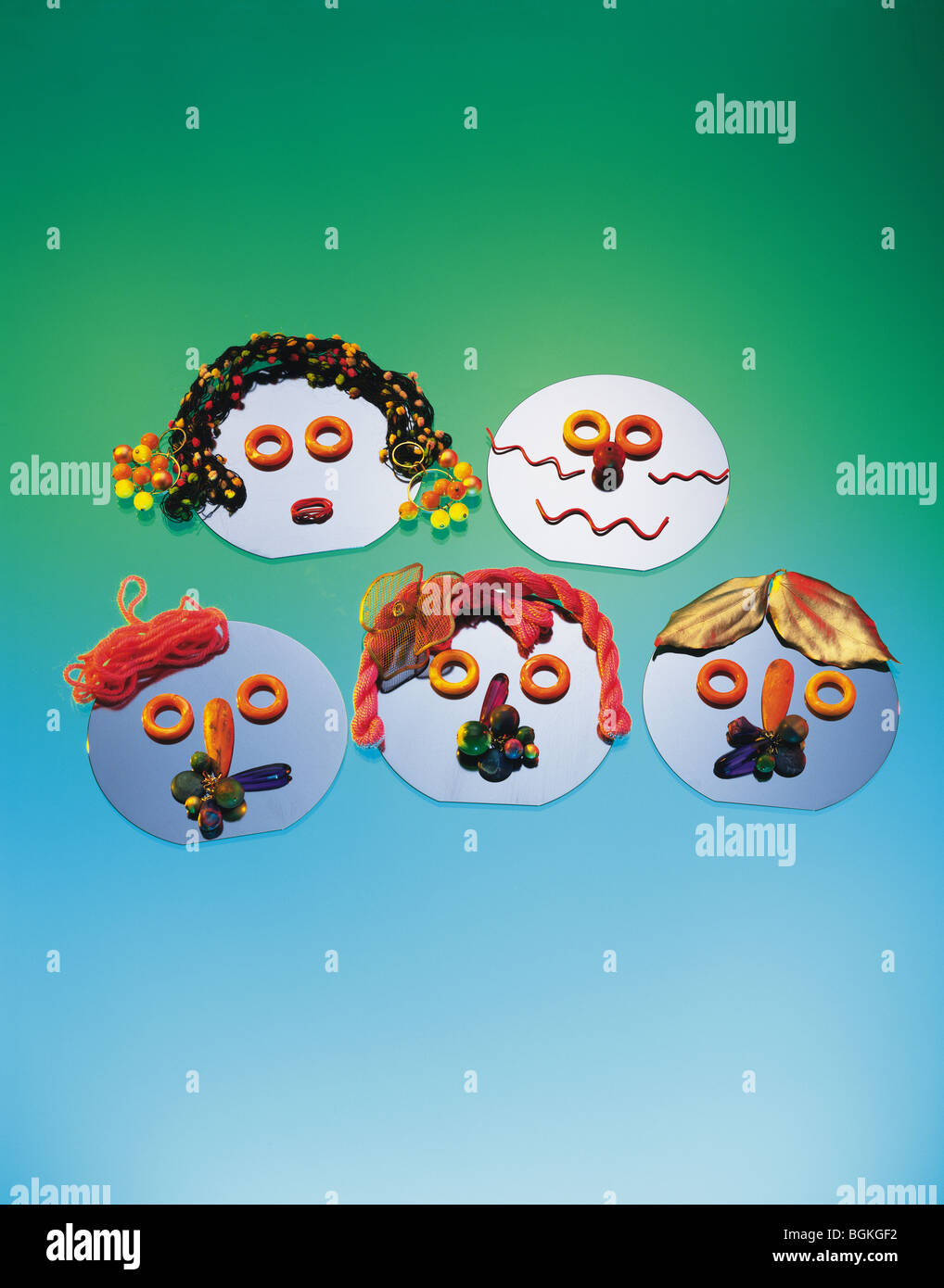 Five masks colored background Stock Photo - Alamy