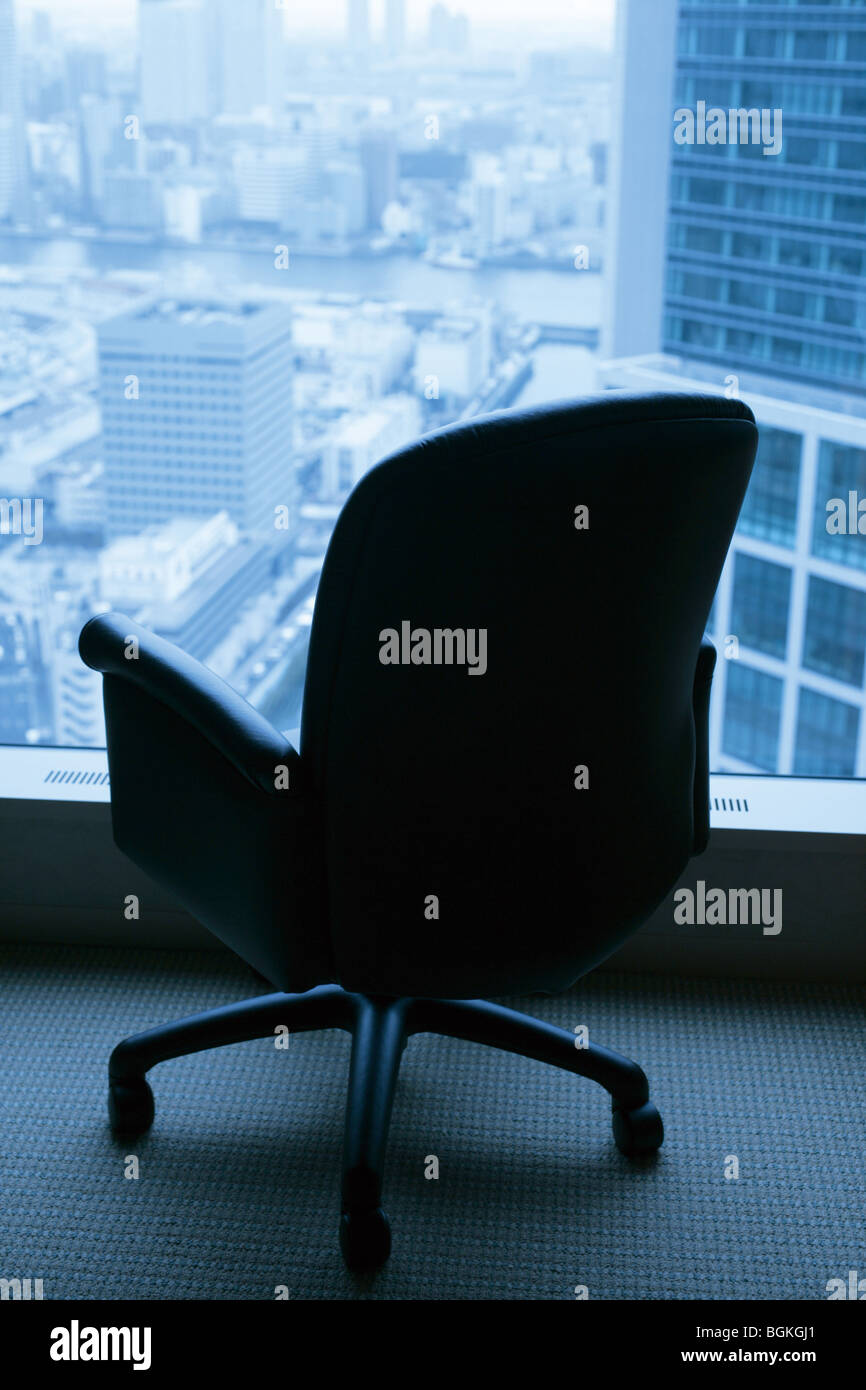 Chair beside window Stock Photo - Alamy