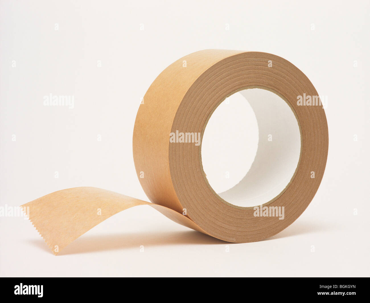 Roll of packing tape close up white background Stock Photo - Alamy