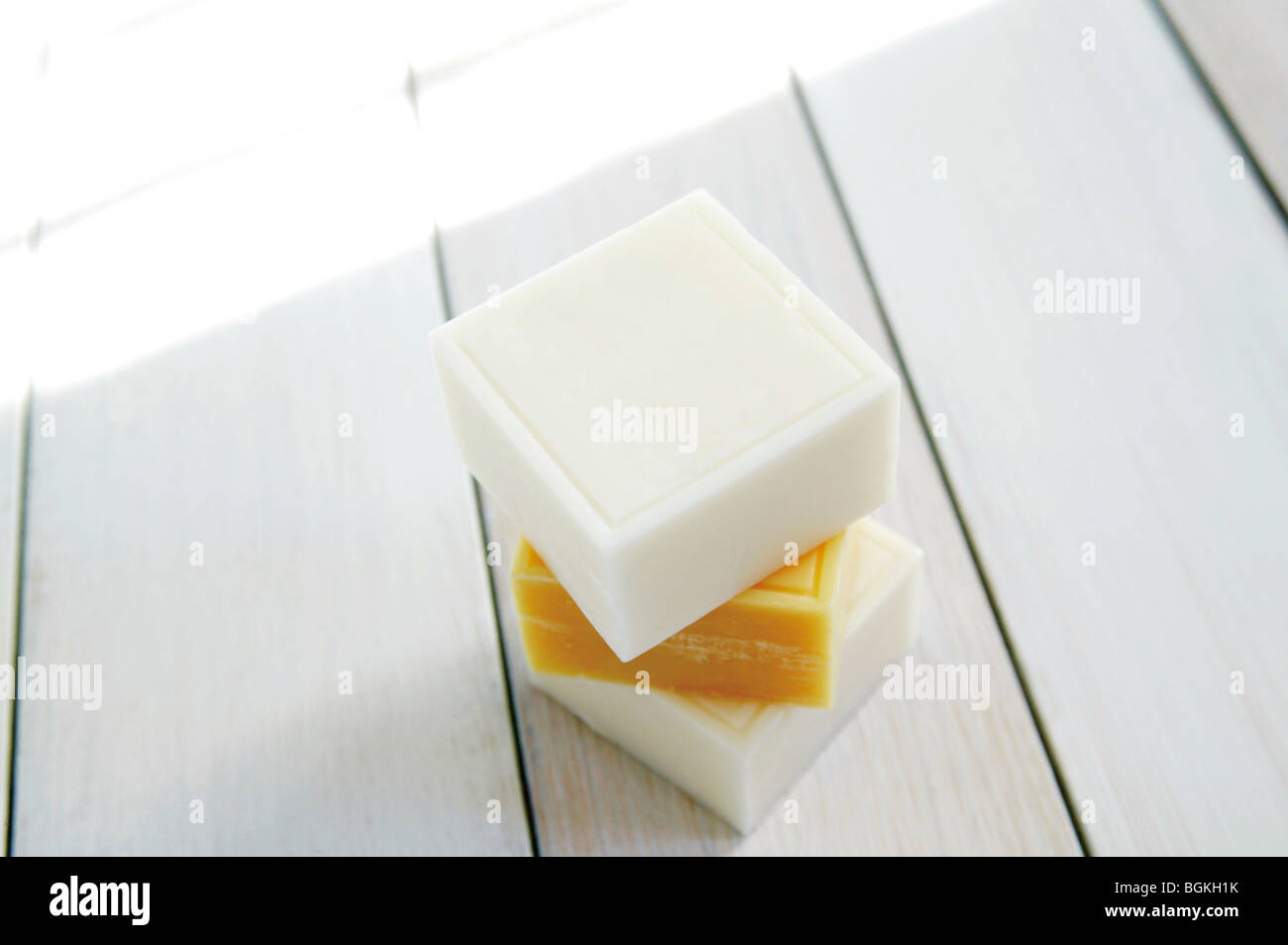 Pile of soaps on floor Stock Photo - Alamy
