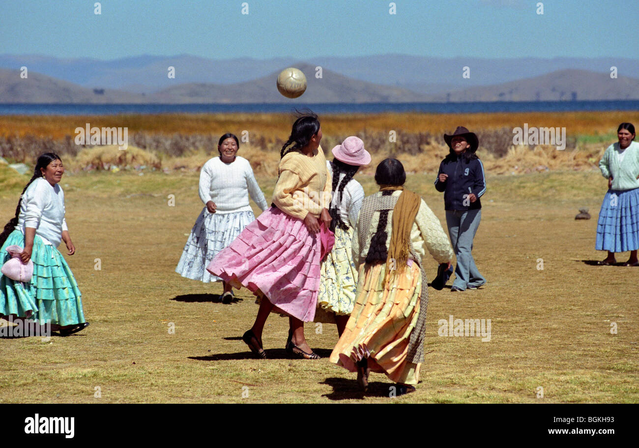 Bolivian indigenous women playing football in Altiplano, at 4100 meters ...