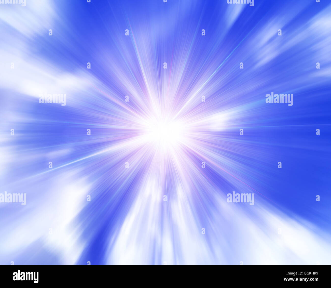 Burst of sunlight in a blue sky Stock Photo - Alamy
