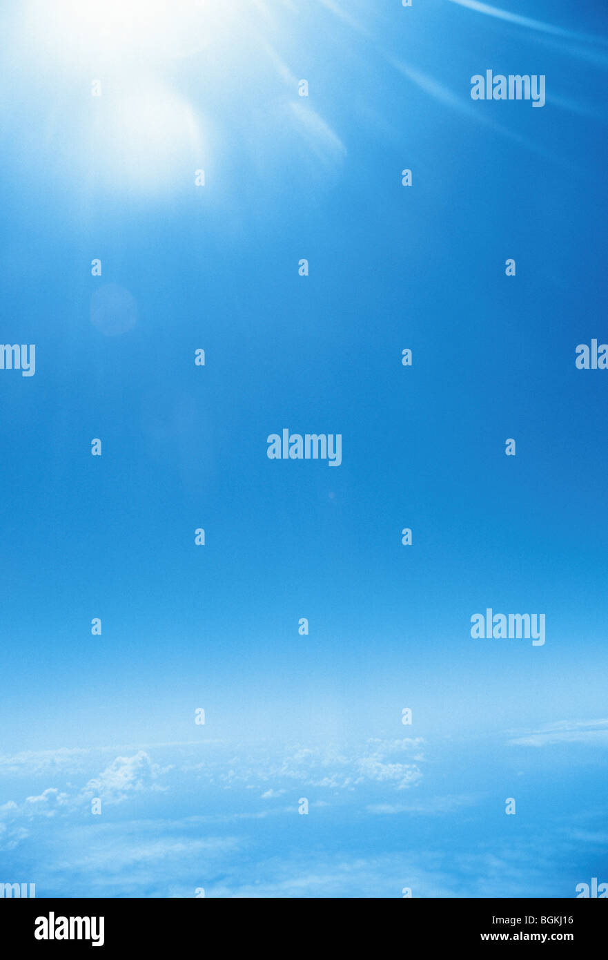 Blue sky with sunbeams Stock Photo - Alamy
