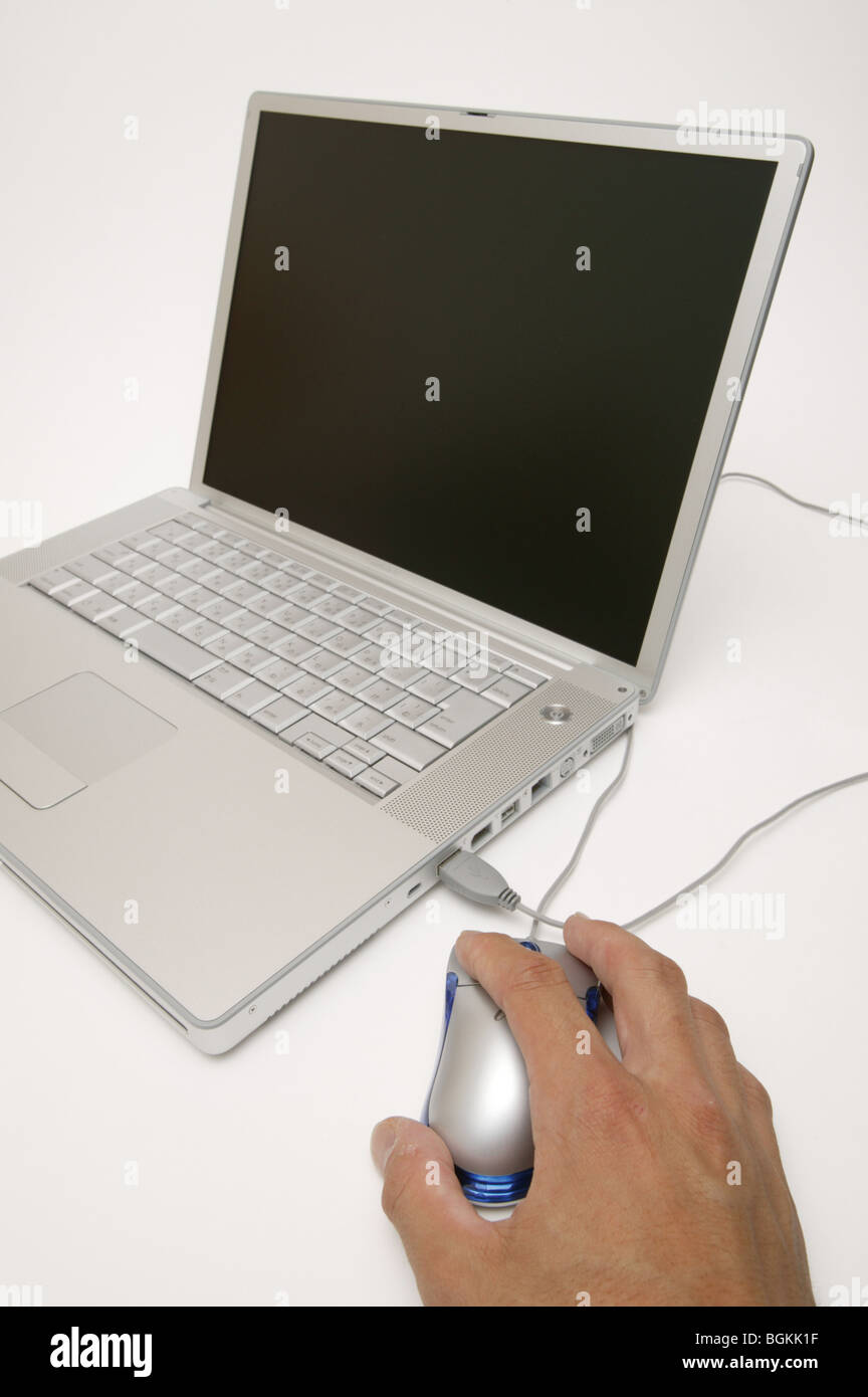 Hand using computer mouse Stock Photo - Alamy