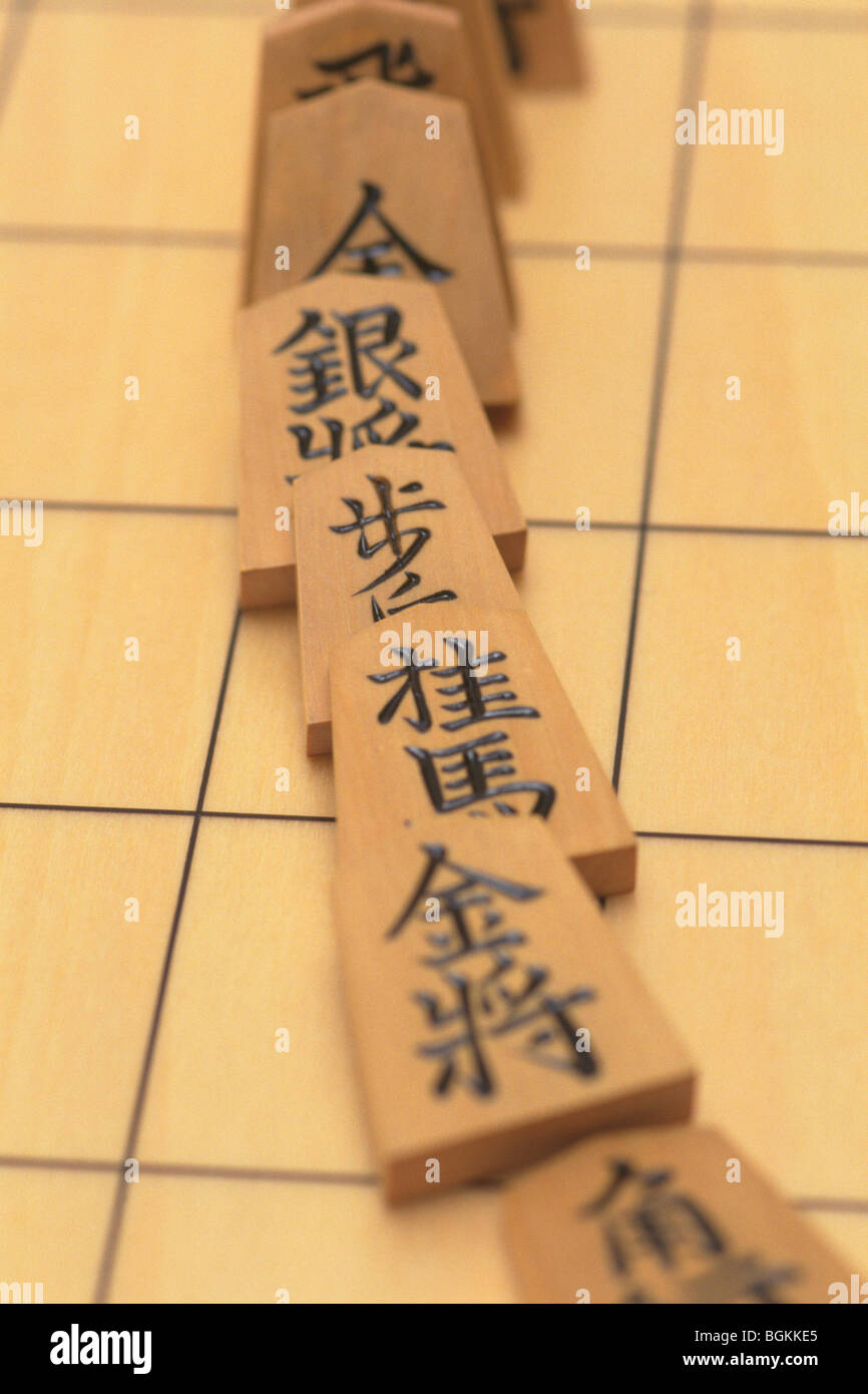 Japanese chess pieces on board close up Stock Photo - Alamy