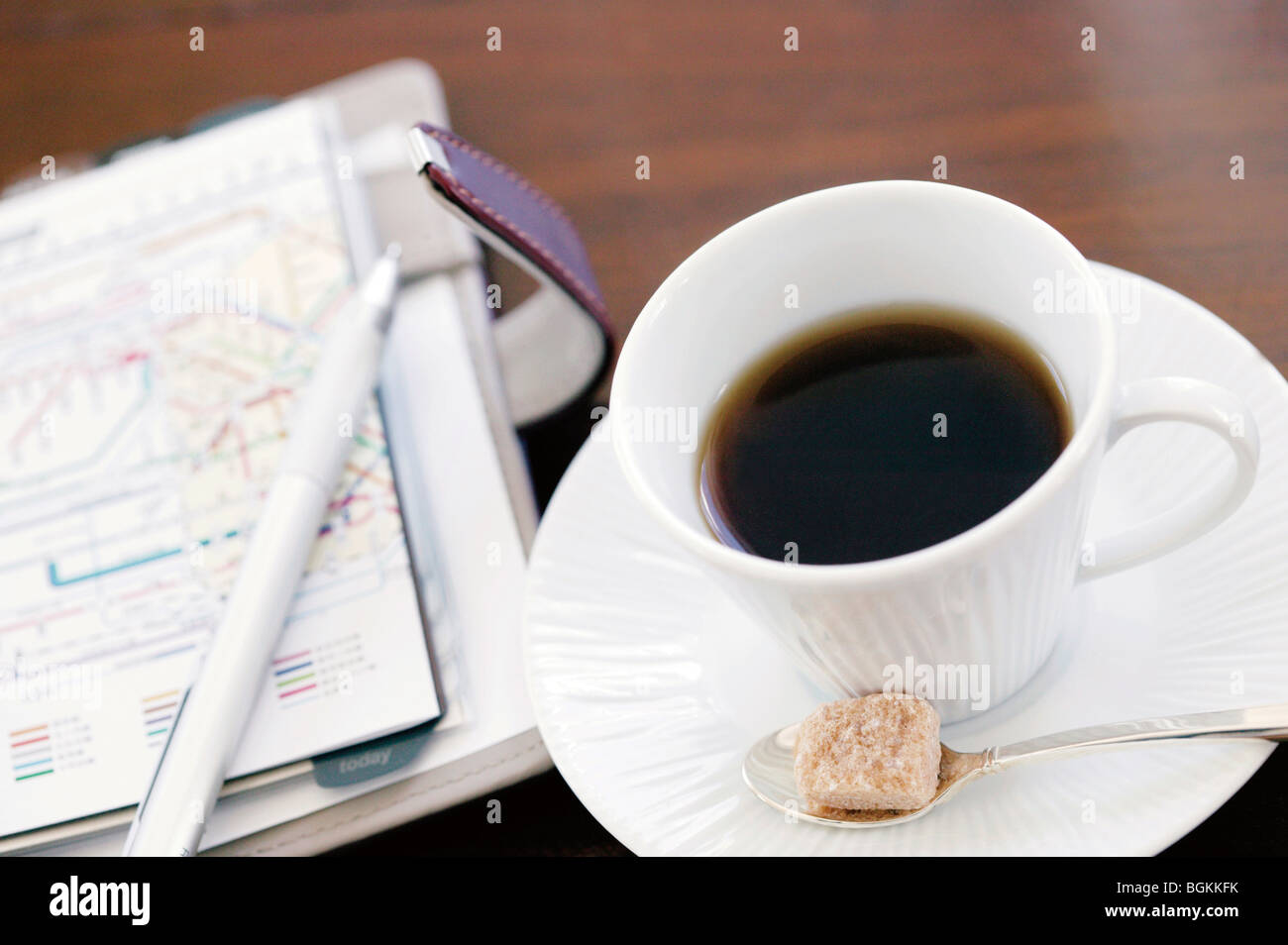 Personal organizer and cup of coffee Stock Photo - Alamy