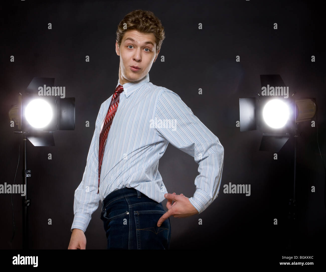 portrait of funny young man on black background Stock Photo - Alamy
