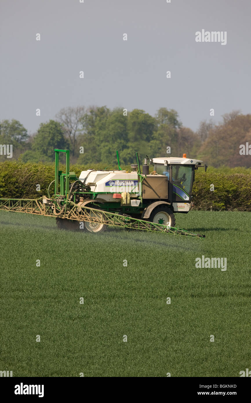 Self Propelled Crop Sprayer Spraying Pesticides On Wheat Stock Photo ...