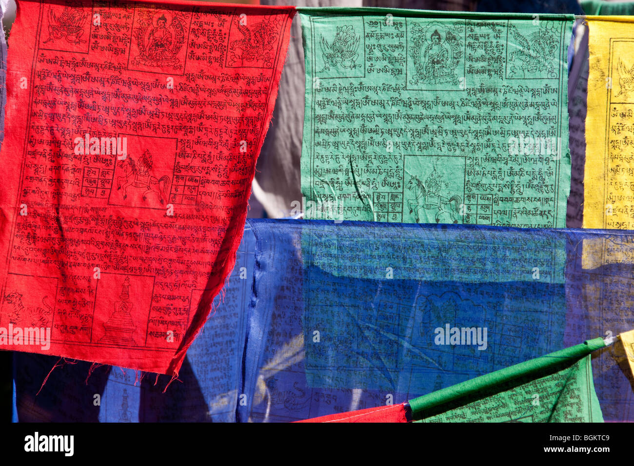 Prayer flags at the Thrumshingla pass at 3800m marking the divide ...