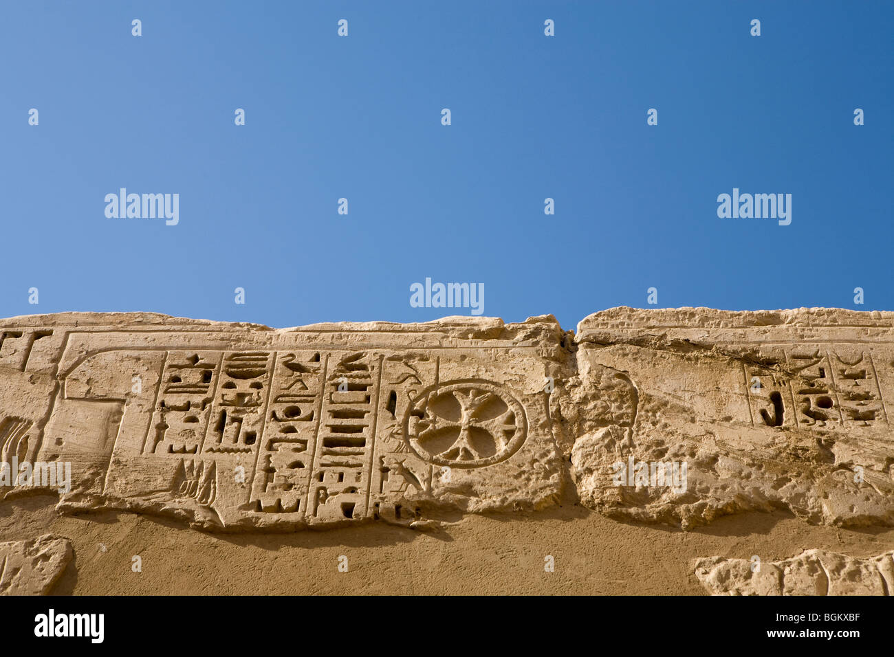 Reliefs on wall showing later coptic cross at Medinet Habu , Mortuary ...