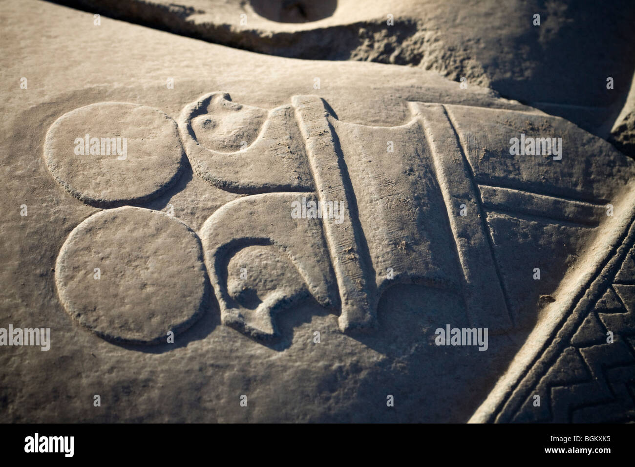 Close up of decoration on fallen and fragmented colossal statue of ...