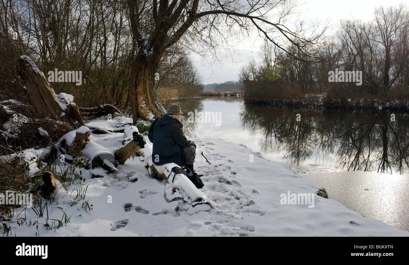 Lonely man snow beach hi-res stock photography and images - Alamy