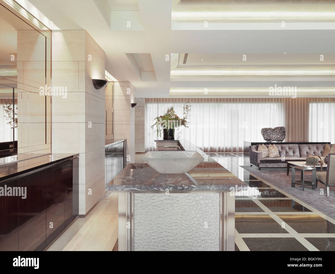 Countertop in lobby with recessed lights Stock Photo - Alamy