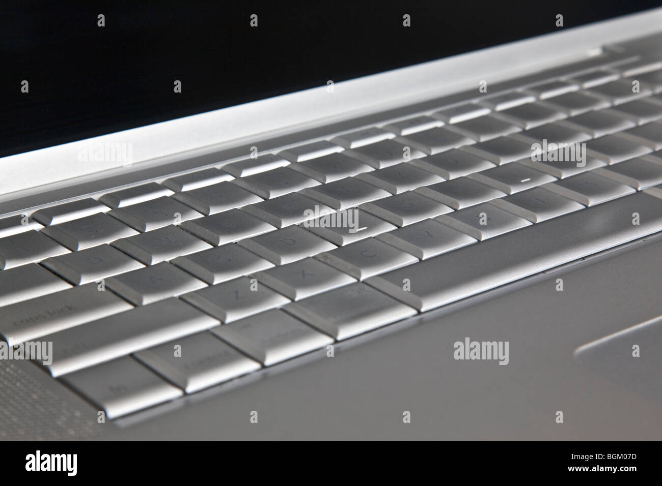 Modern silver Laptop keyboard concept photo Stock Photo - Alamy
